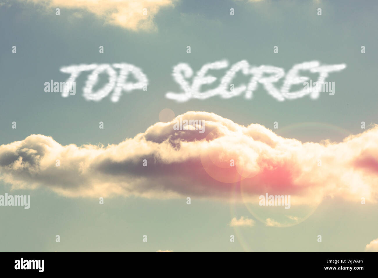 The word top secret against bright blue sky with cloud Stock Photo - Alamy