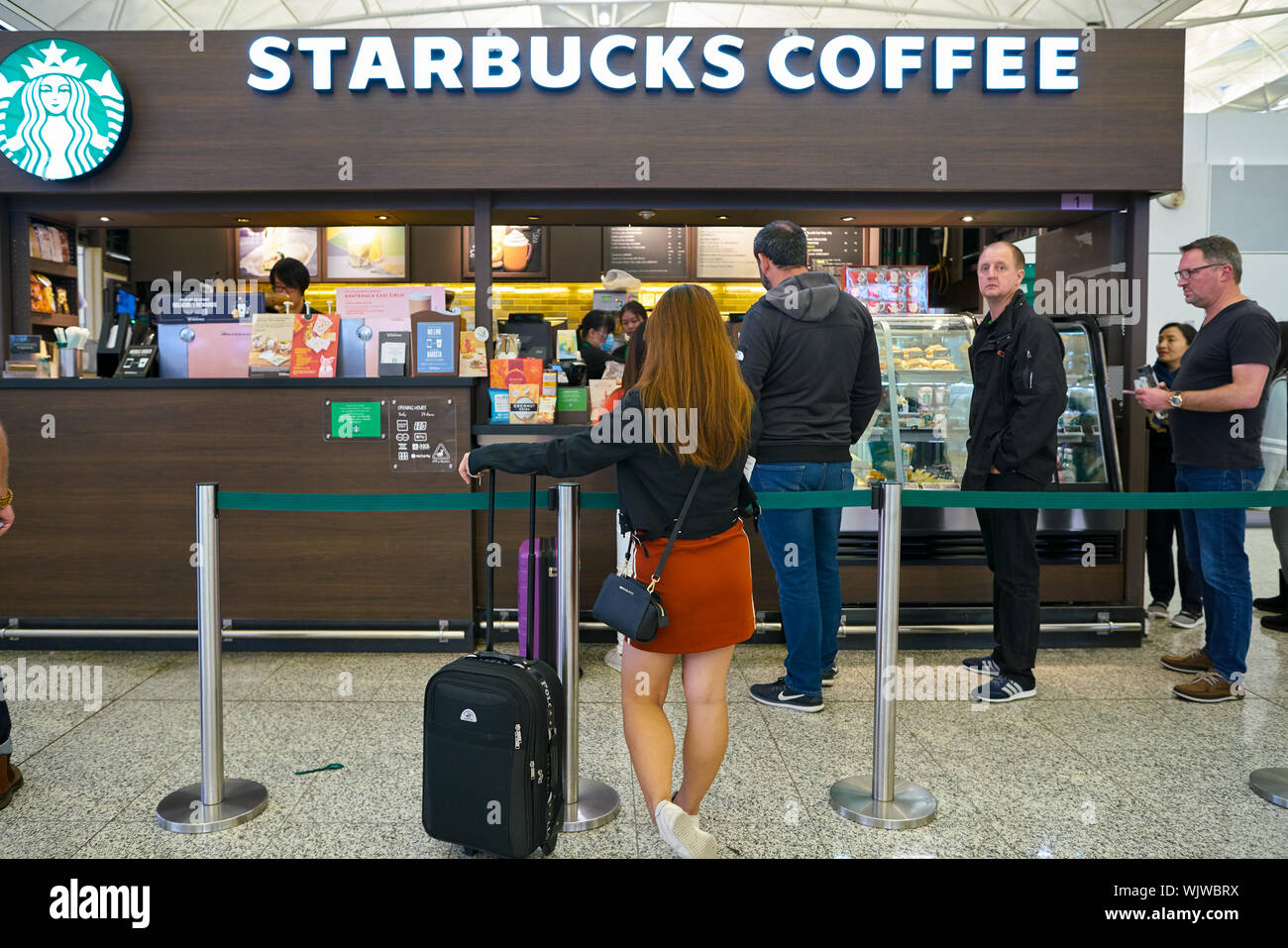 HONG KONG, CHINA - CIRCA JANUARY, 2019: a queue of people at Starbacks Coffee in Hong Kong ...
