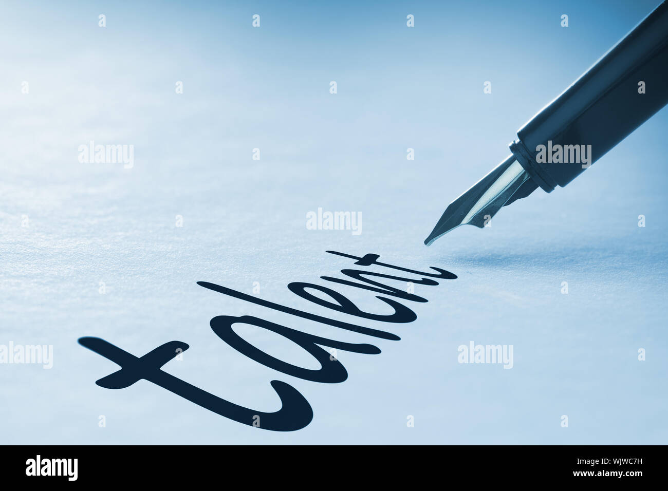 Fountain pen writing the word talent Stock Photo - Alamy