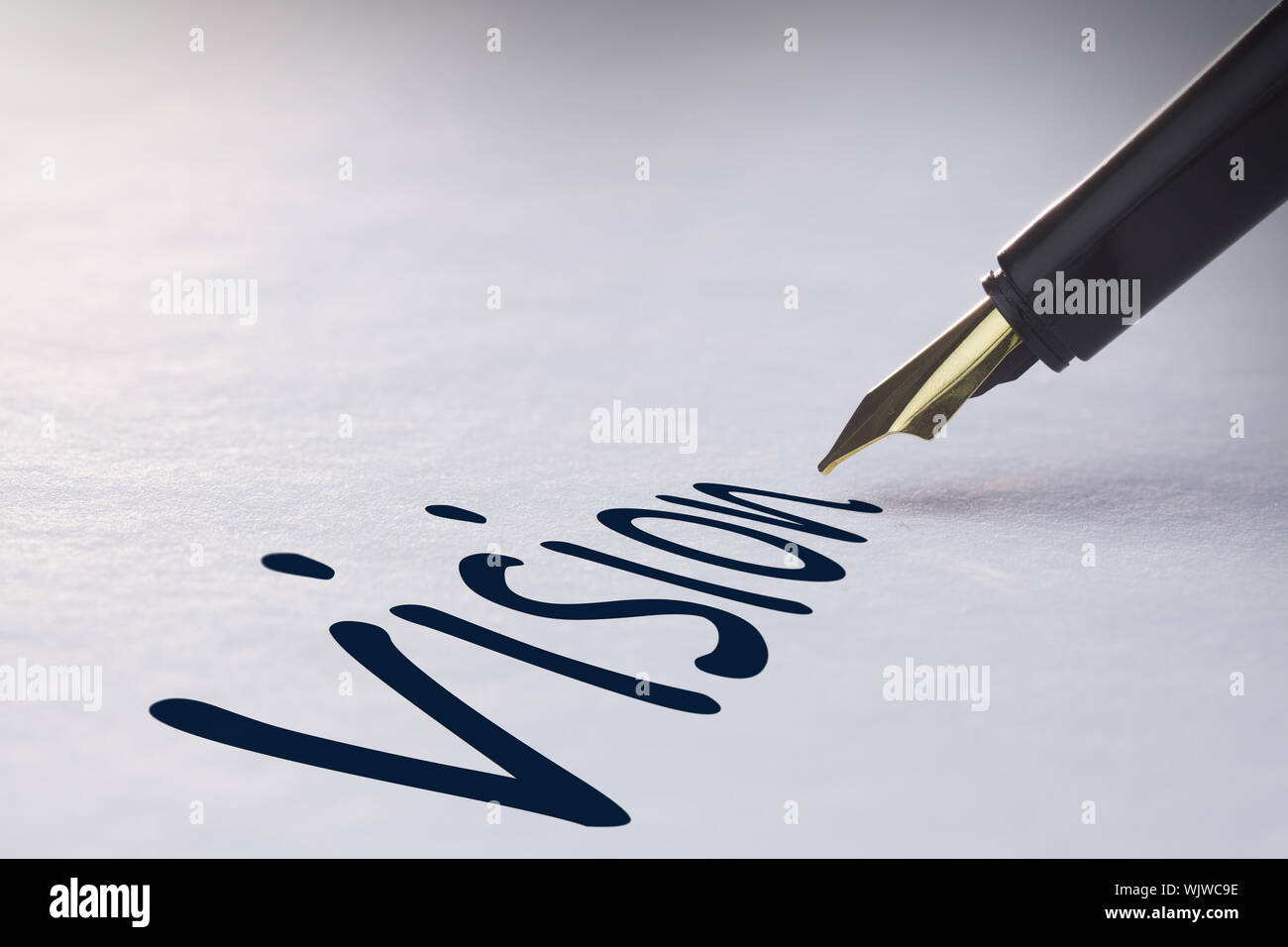 Fountain pen writing the word vision Stock Photo - Alamy