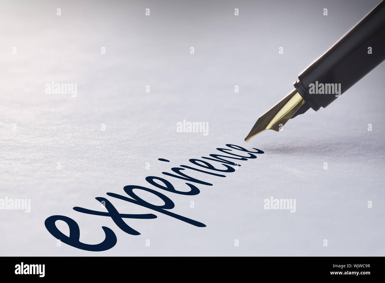 Fountain pen writing the word experience Stock Photo - Alamy