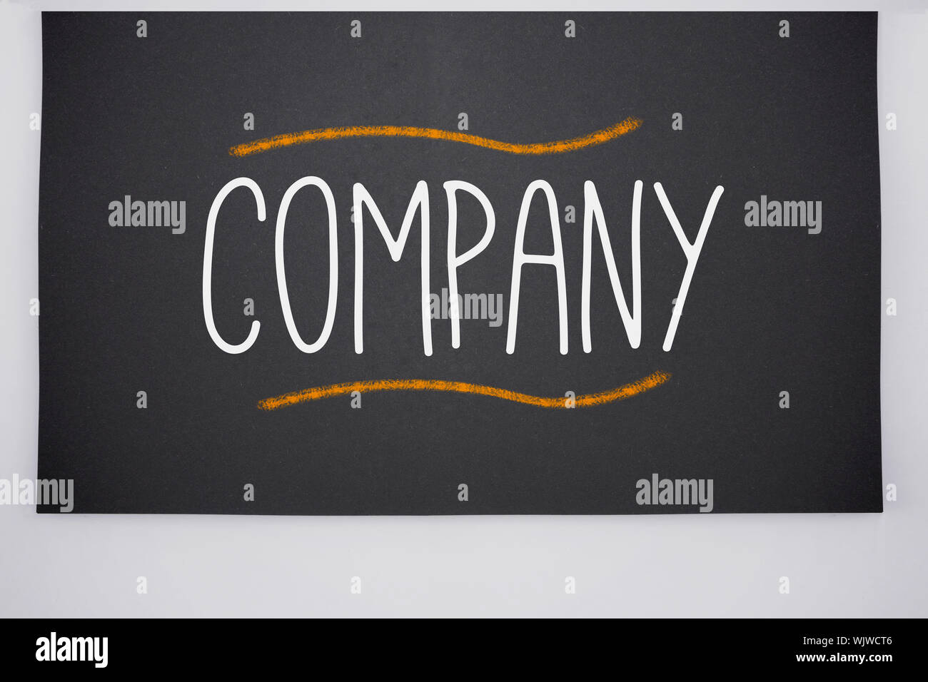 The word company written on big blackboard Stock Photo - Alamy
