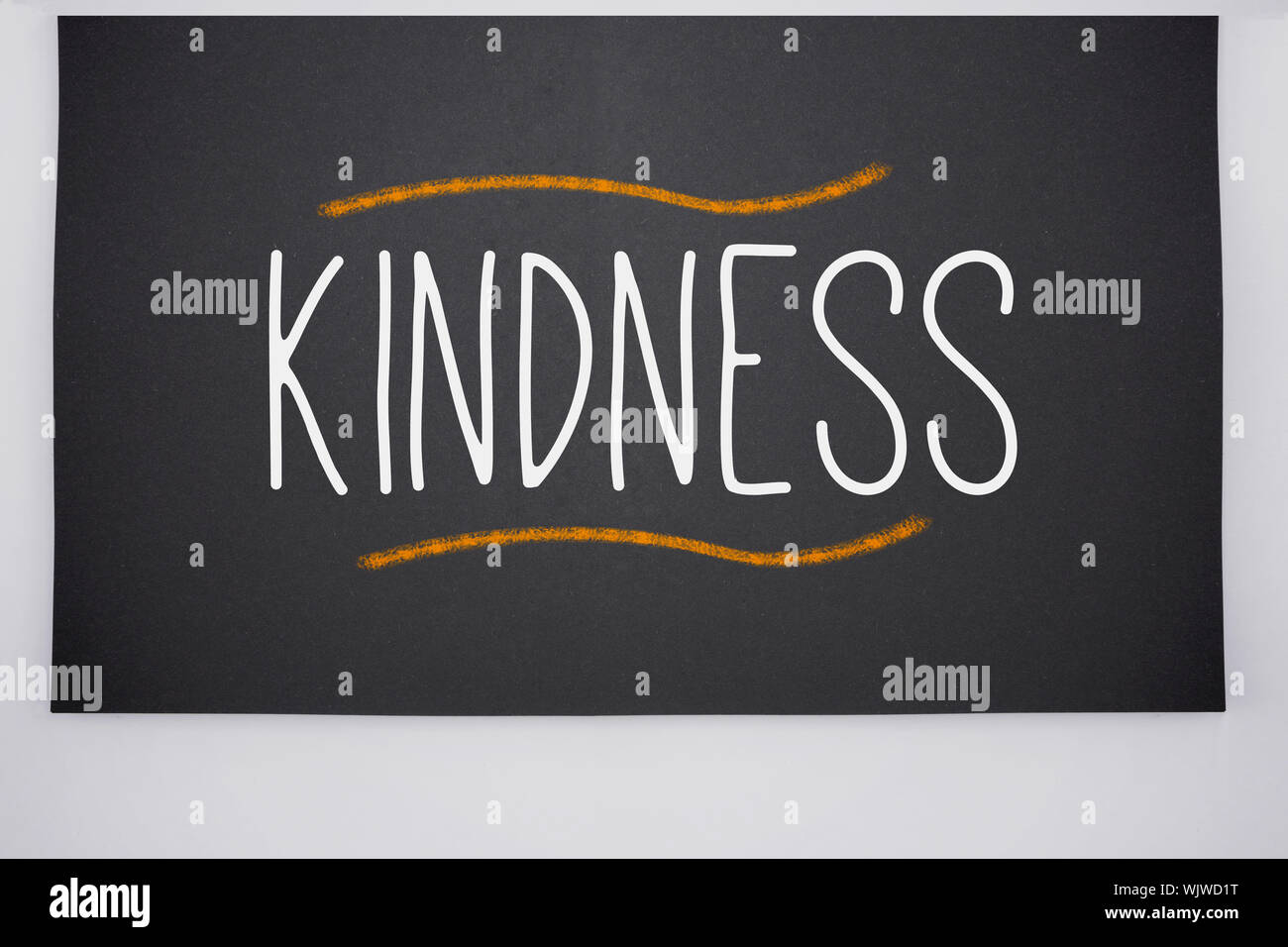 The word kindness written on big blackboard Stock Photo - Alamy