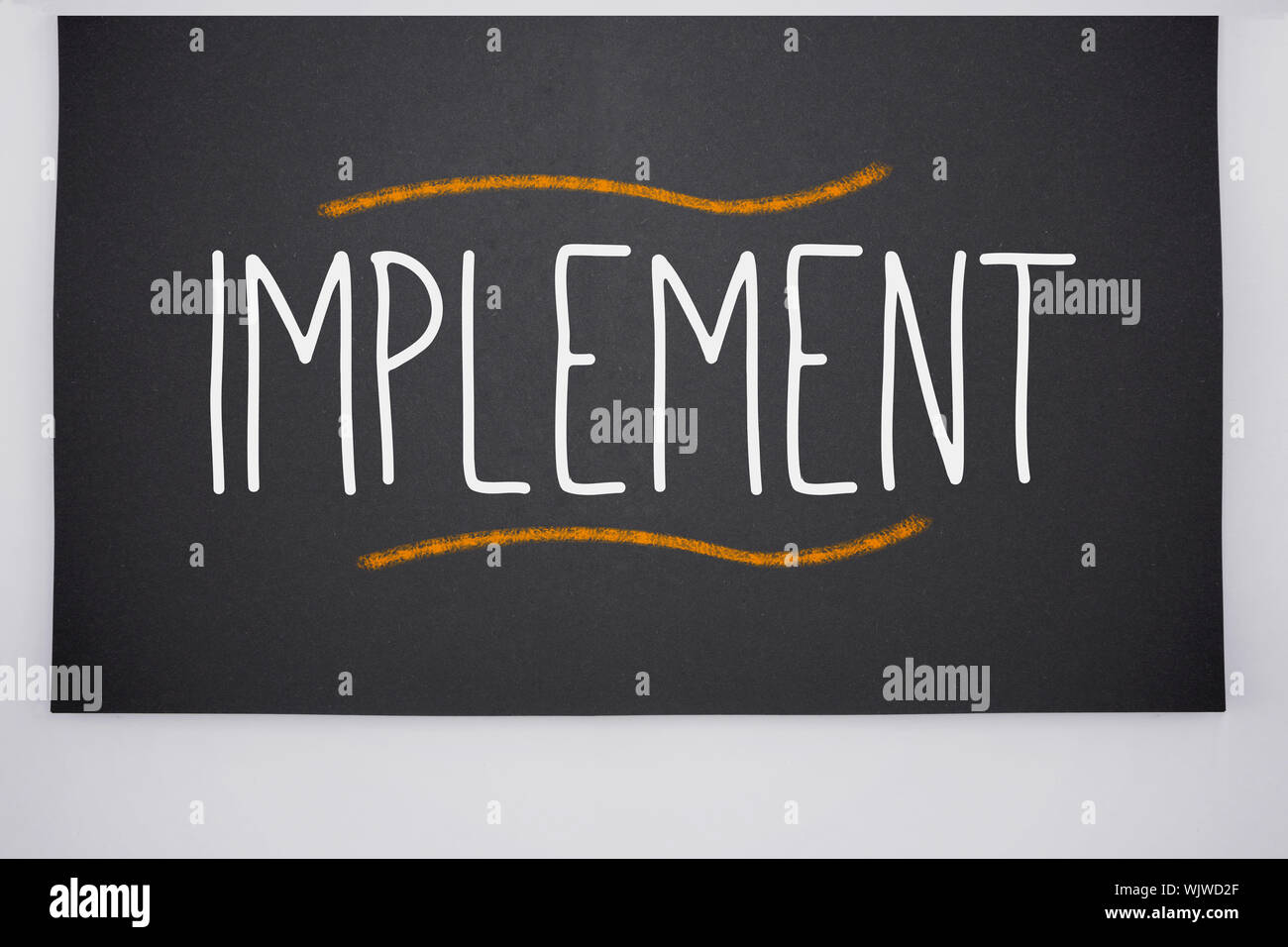 The word implement written on big blackboard Stock Photo - Alamy The word implement written on big blackboard Stock Photo - Alamy