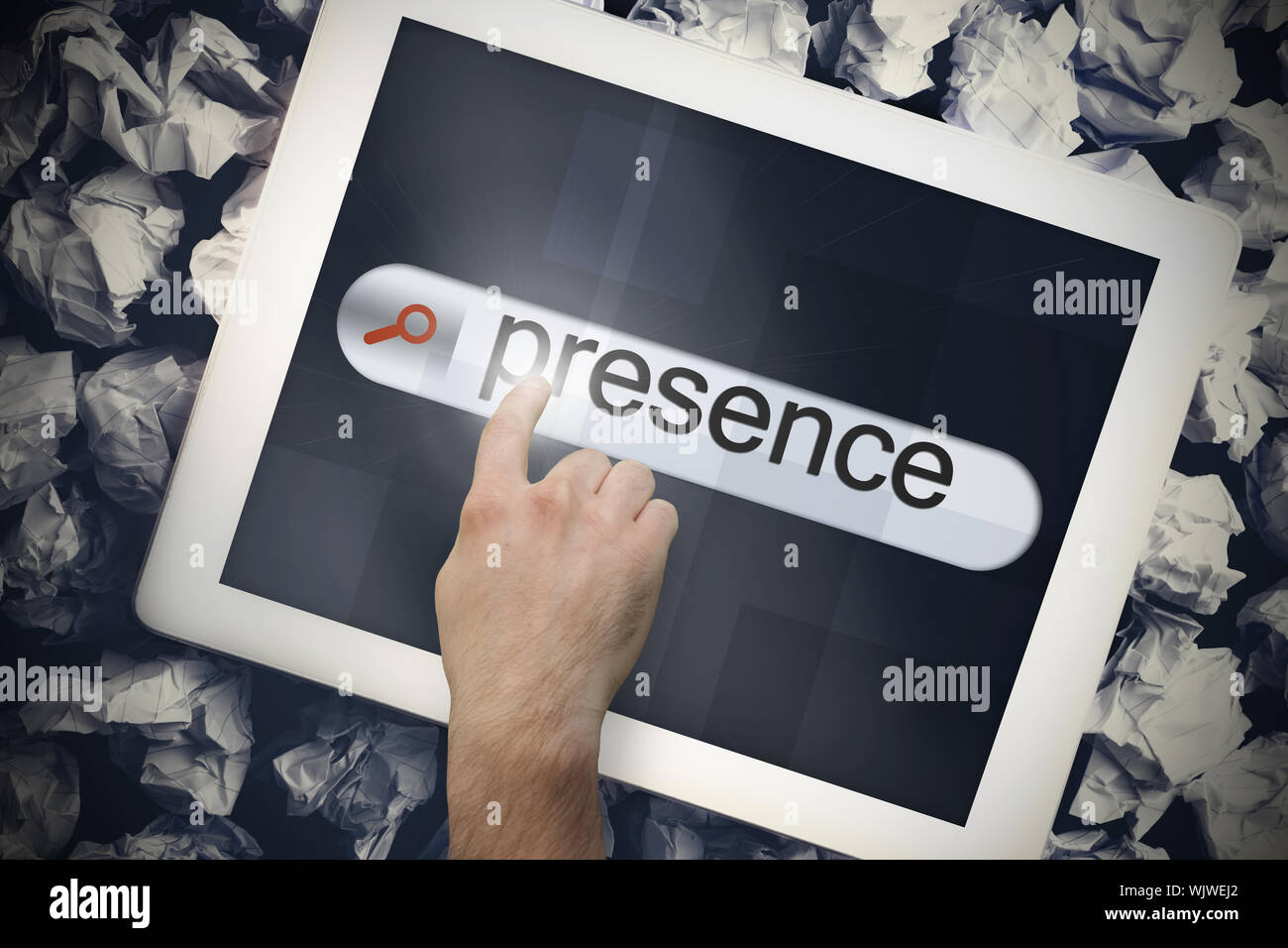 Hand touching the word presence on search bar on tablet screen on ...