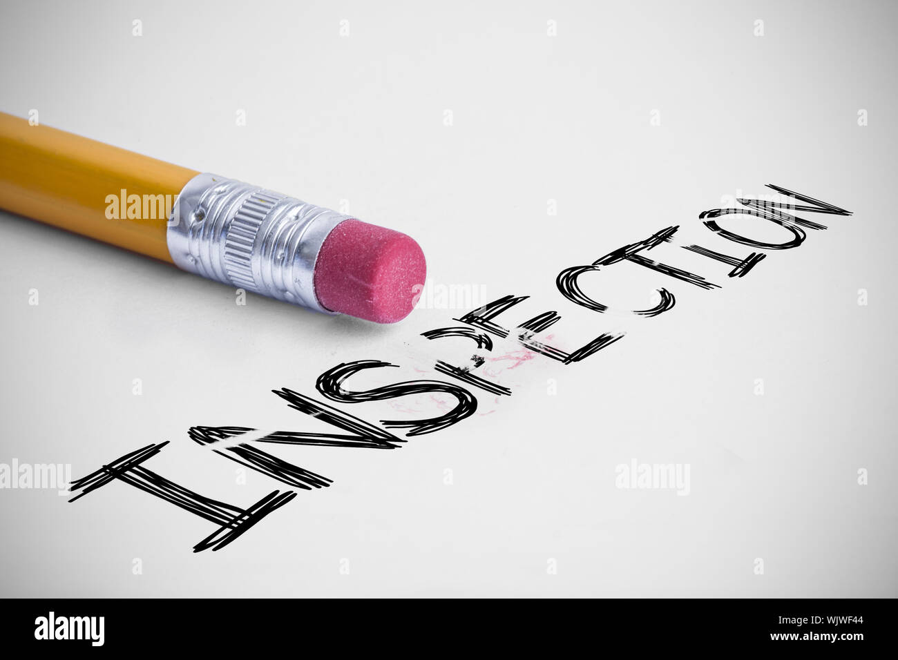 The word inspection against pencil with an eraser Stock Photo - Alamy