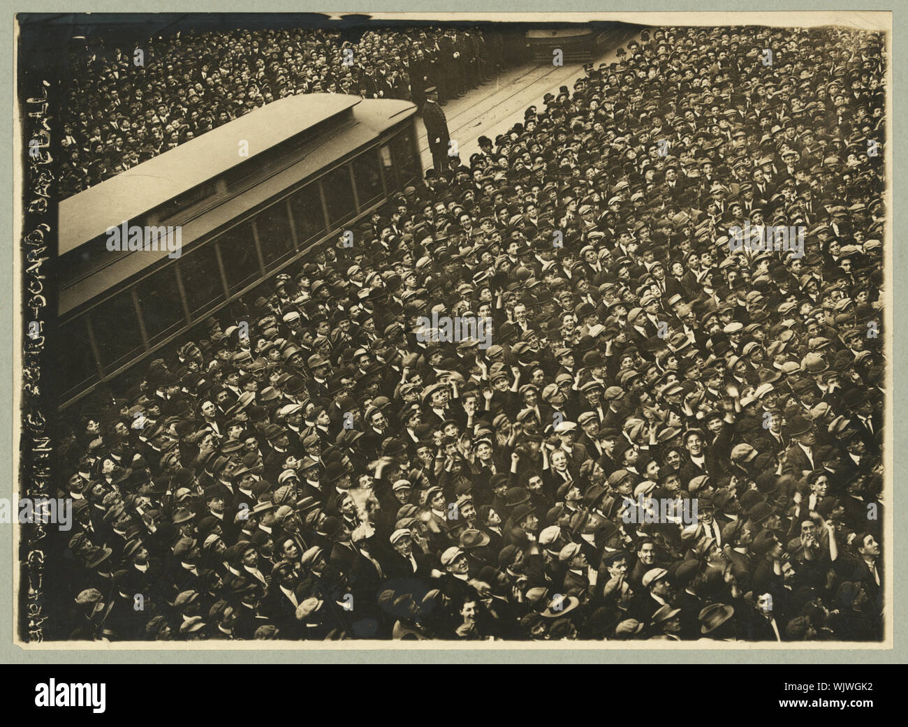 Huge crowd of baseball fans watching baseball scoreboard during World ...