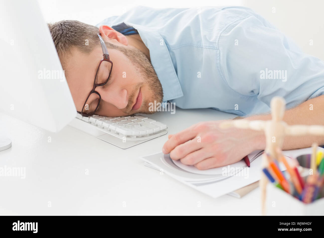 Man sleeping keyboard in computer hi-res stock photography and images ...