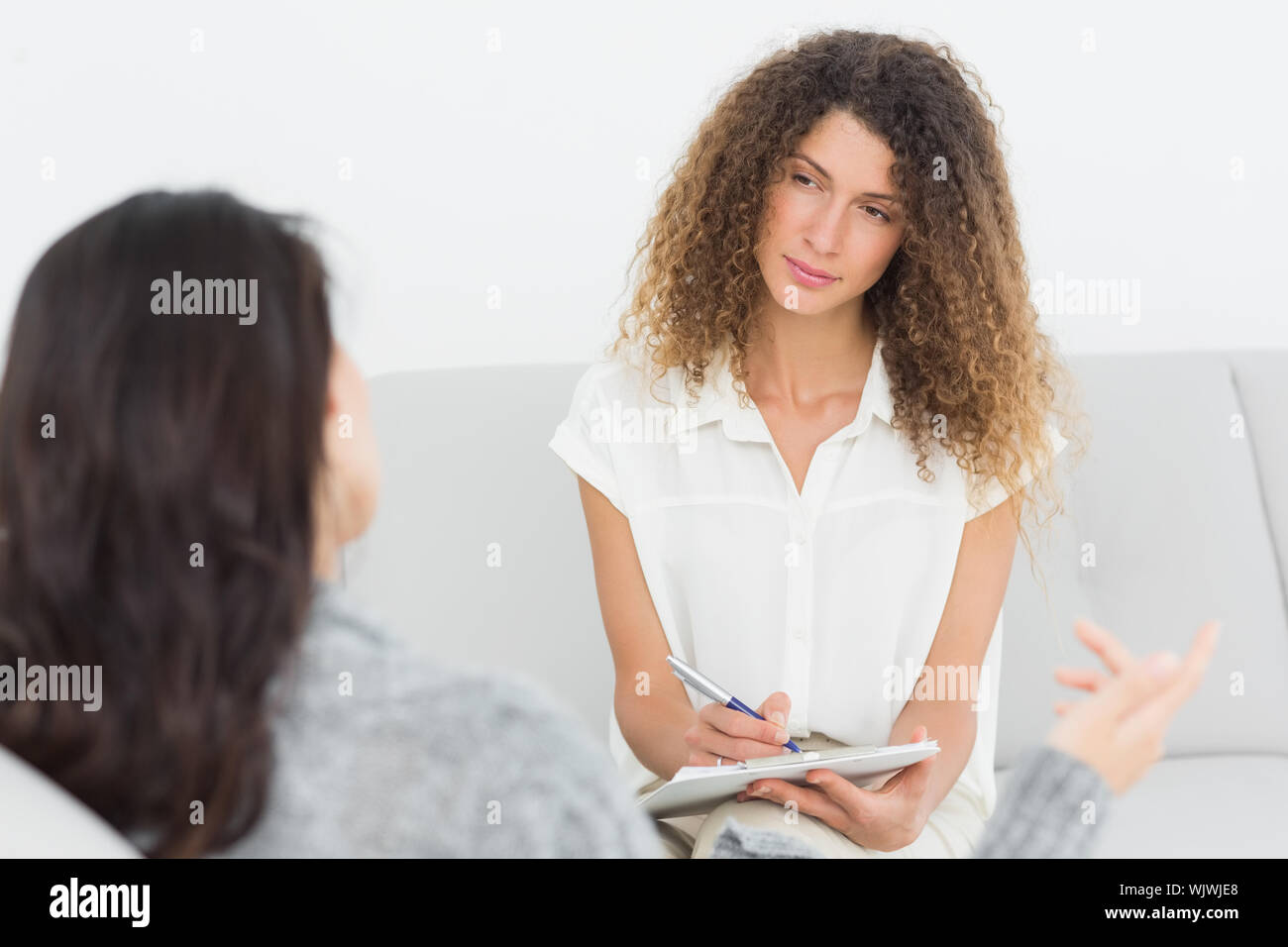 Female therapist gesturing talking hi-res stock photography and images ...