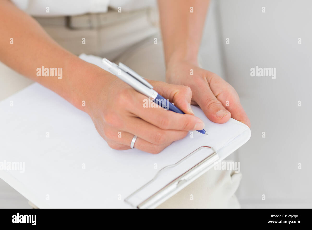 Psychologist taking notes on clipboard hi-res stock photography and ...