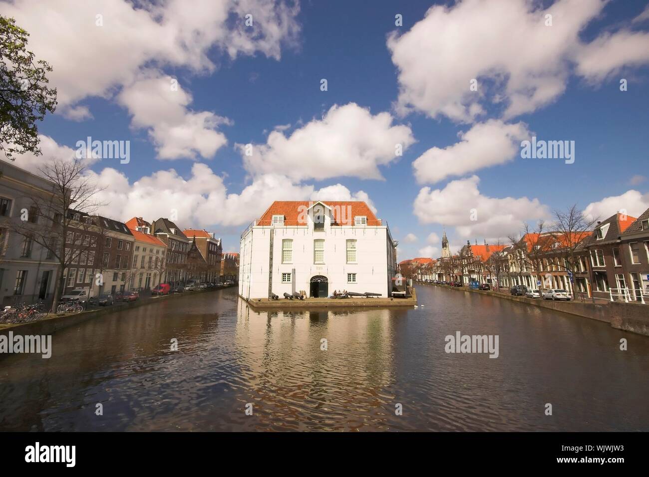 Old fortification building at the edge of a canal in Delft, Holland ...