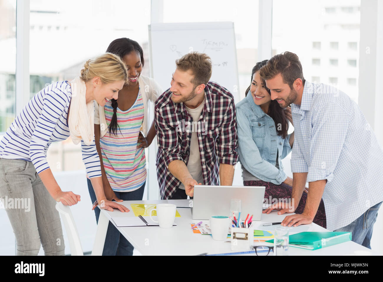 Creative team designers speaking in hi-res stock photography and images ...