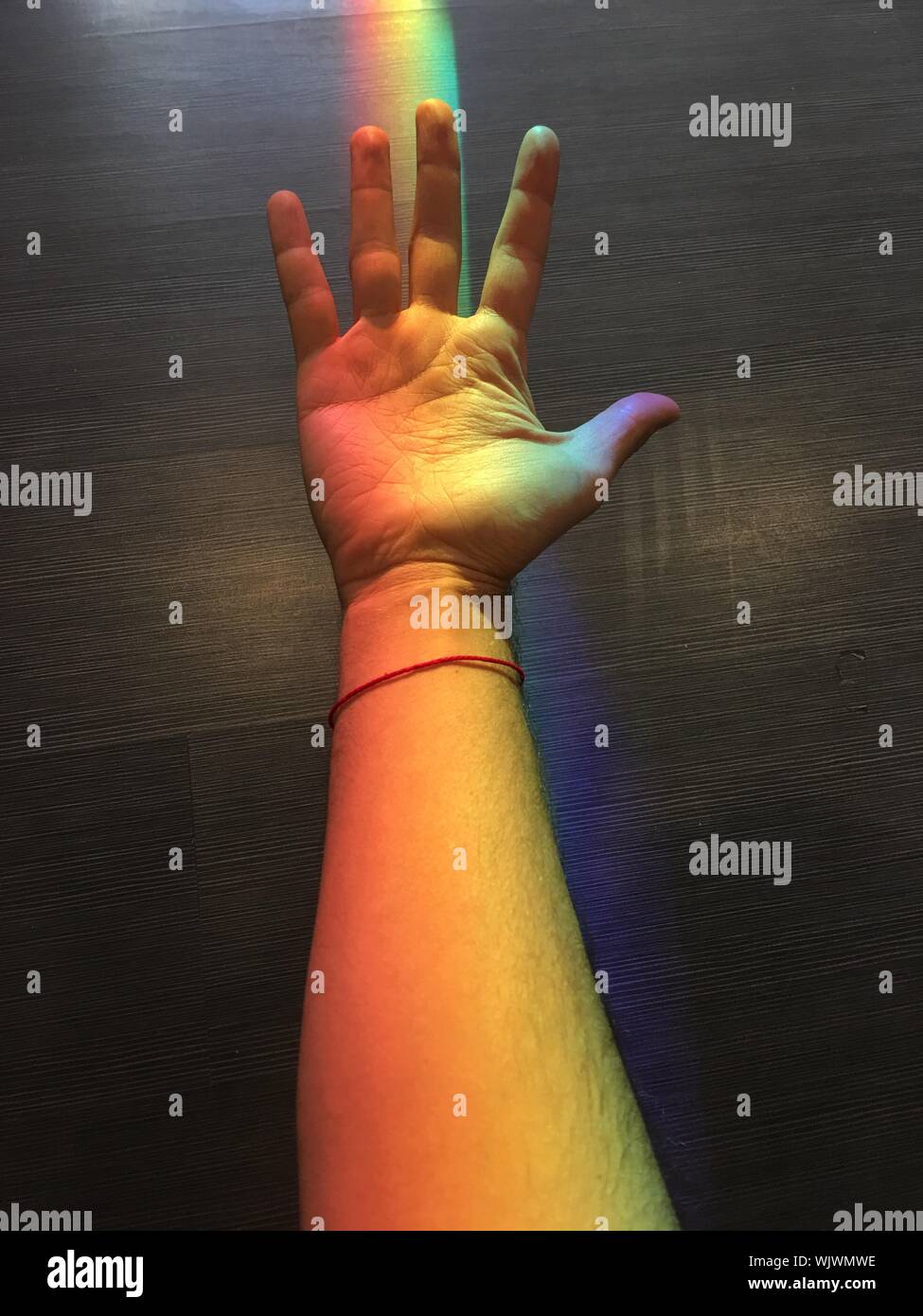 Hand showing light hi-res stock photography and images - Alamy