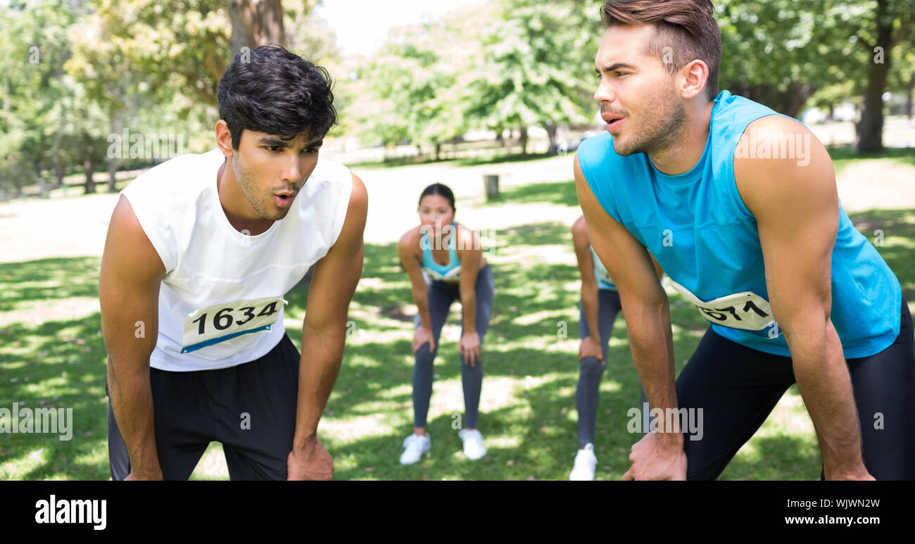 Male female runners standing hi-res stock photography and images - Alamy