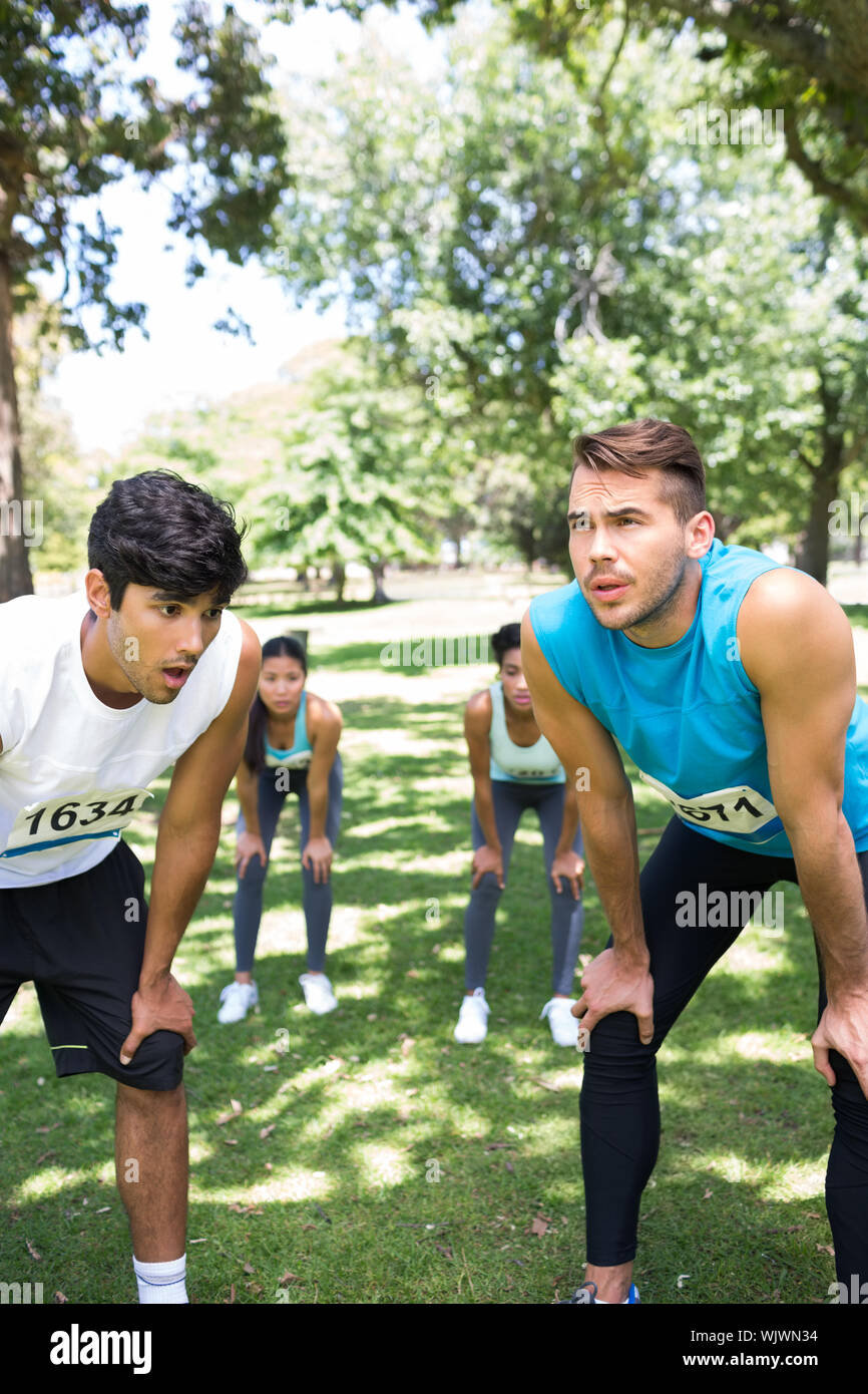 Male female runners standing hi-res stock photography and images - Alamy