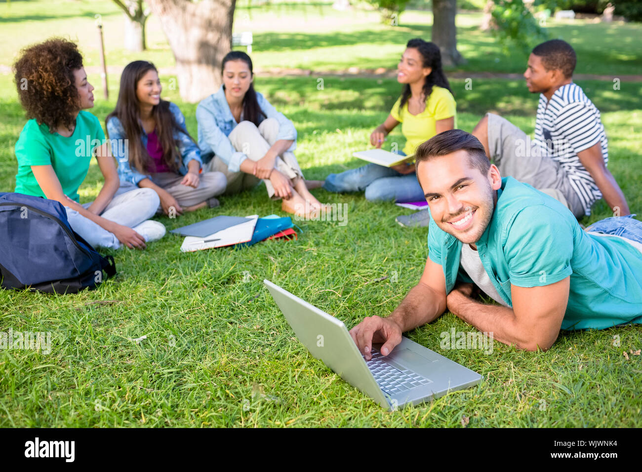 Group of university students studying at college campus Stock Photo - Alamy