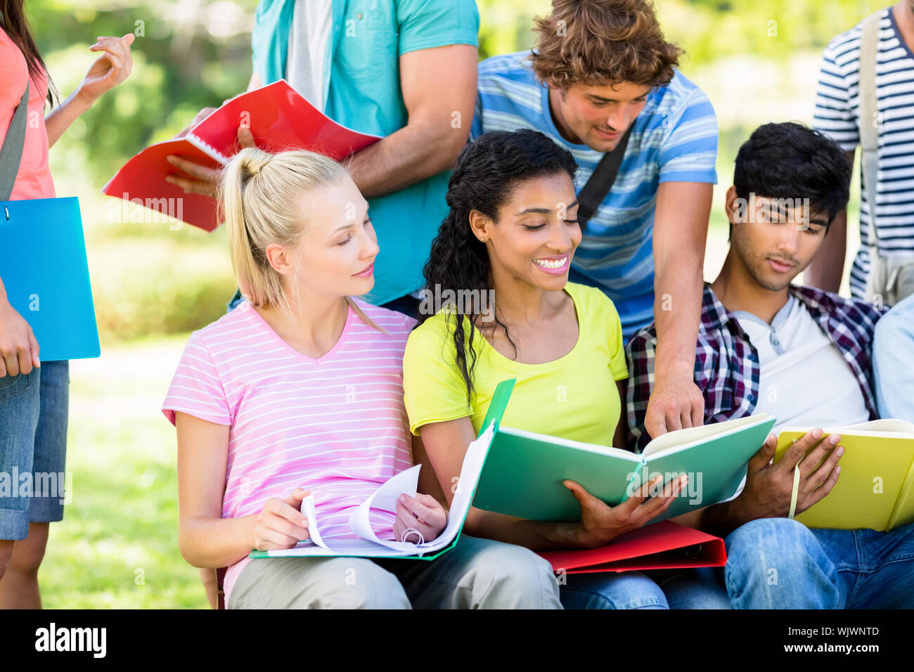 Group of university students studying at college campus Stock Photo - Alamy