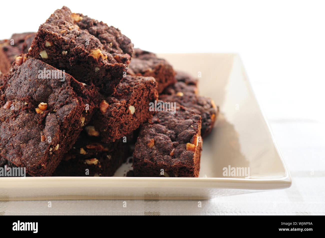 Homemade chocolate brownies served on a plate Stock Photo - Alamy