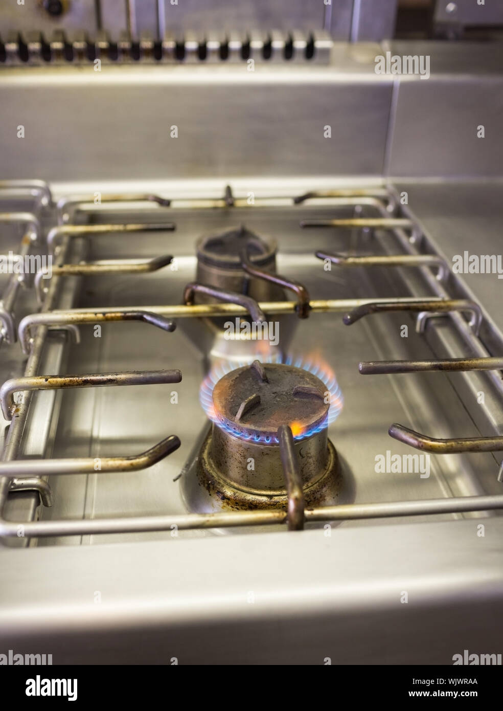 Closeup of burning gas on the kitchen gas stove Stock Photo - Alamy