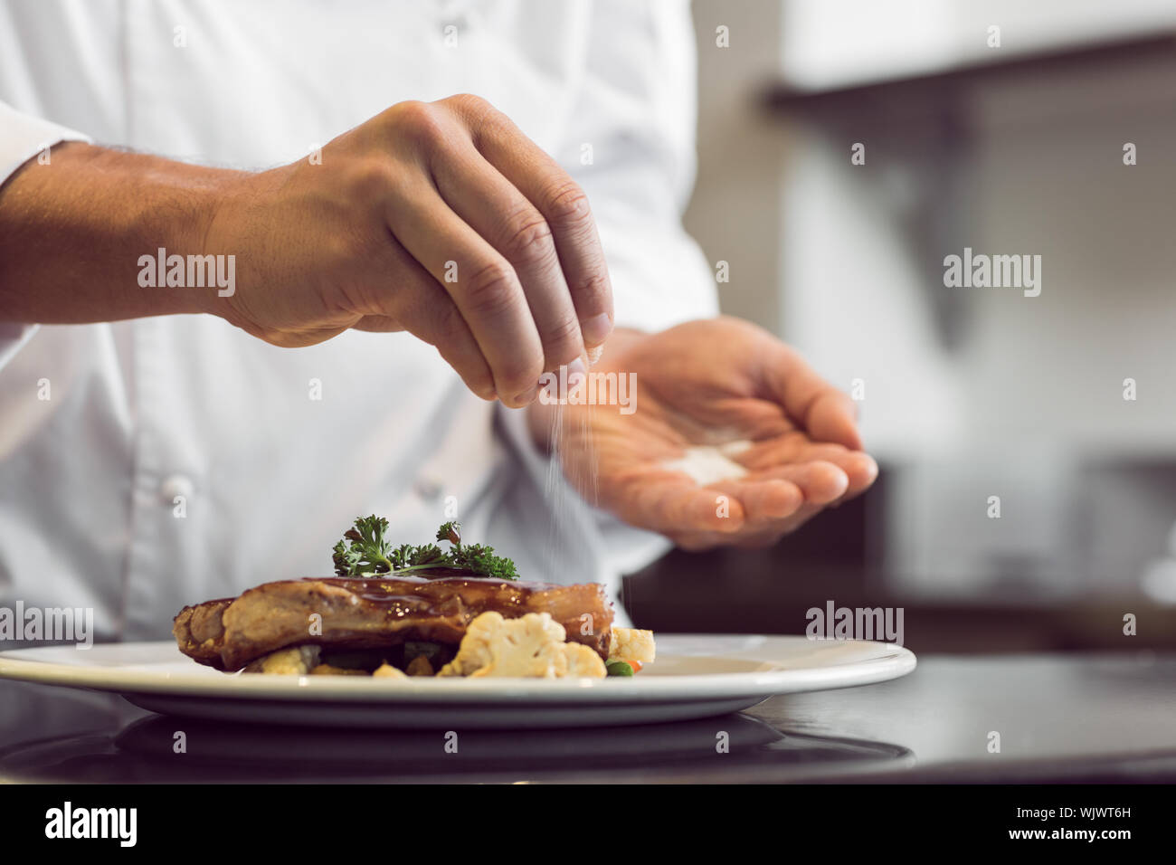Putting salt hi-res stock photography and images - Alamy