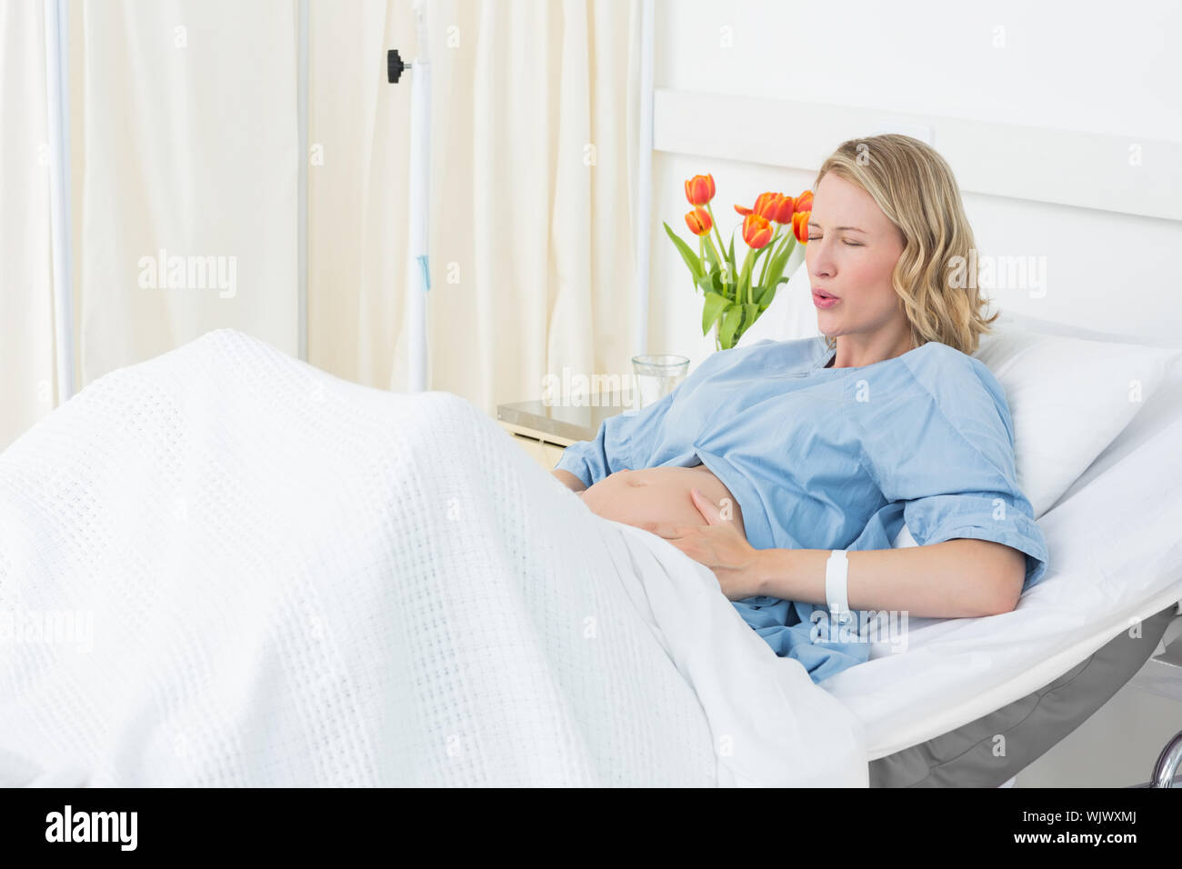 Labor pains hi-res stock photography and images - Alamy