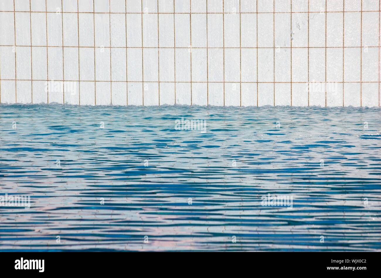 Detail of a white tiled swimming pool Stock Photo - Alamy