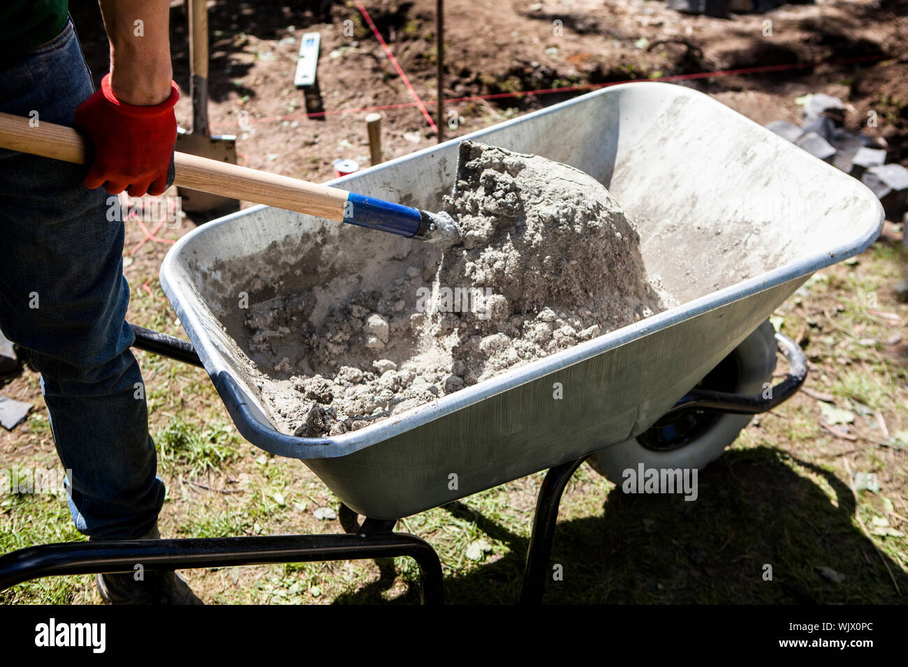 Man mixing cement hi-res stock photography and images - Alamy