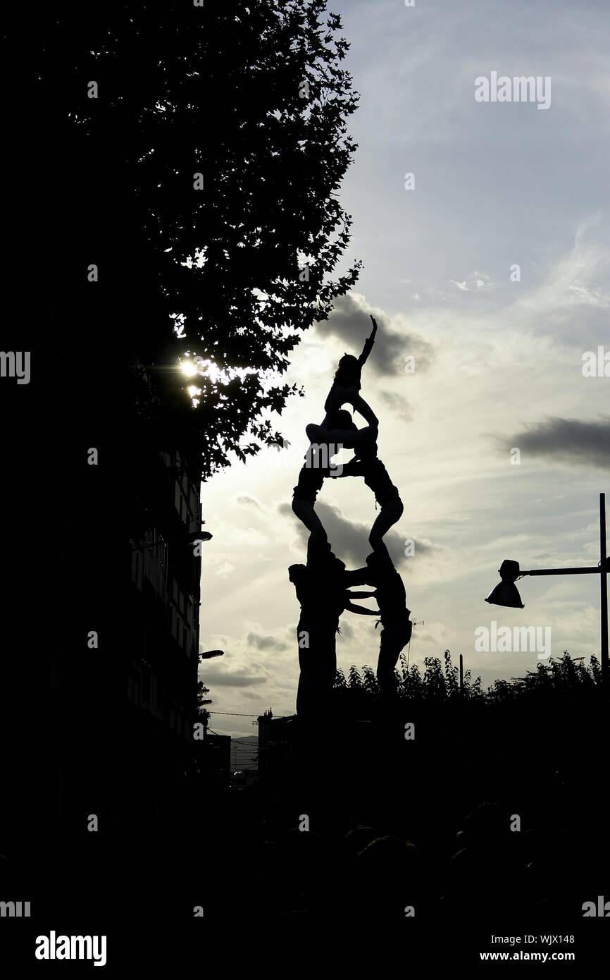 People pyramid forming hi-res stock photography and images - Alamy