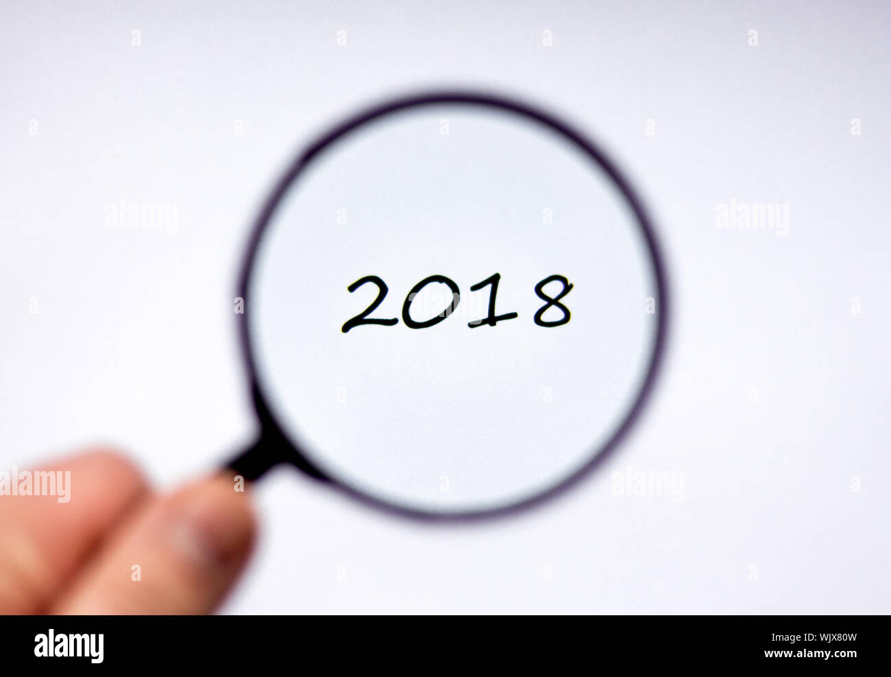 Magnifying glass over numbers hi-res stock photography and images - Alamy