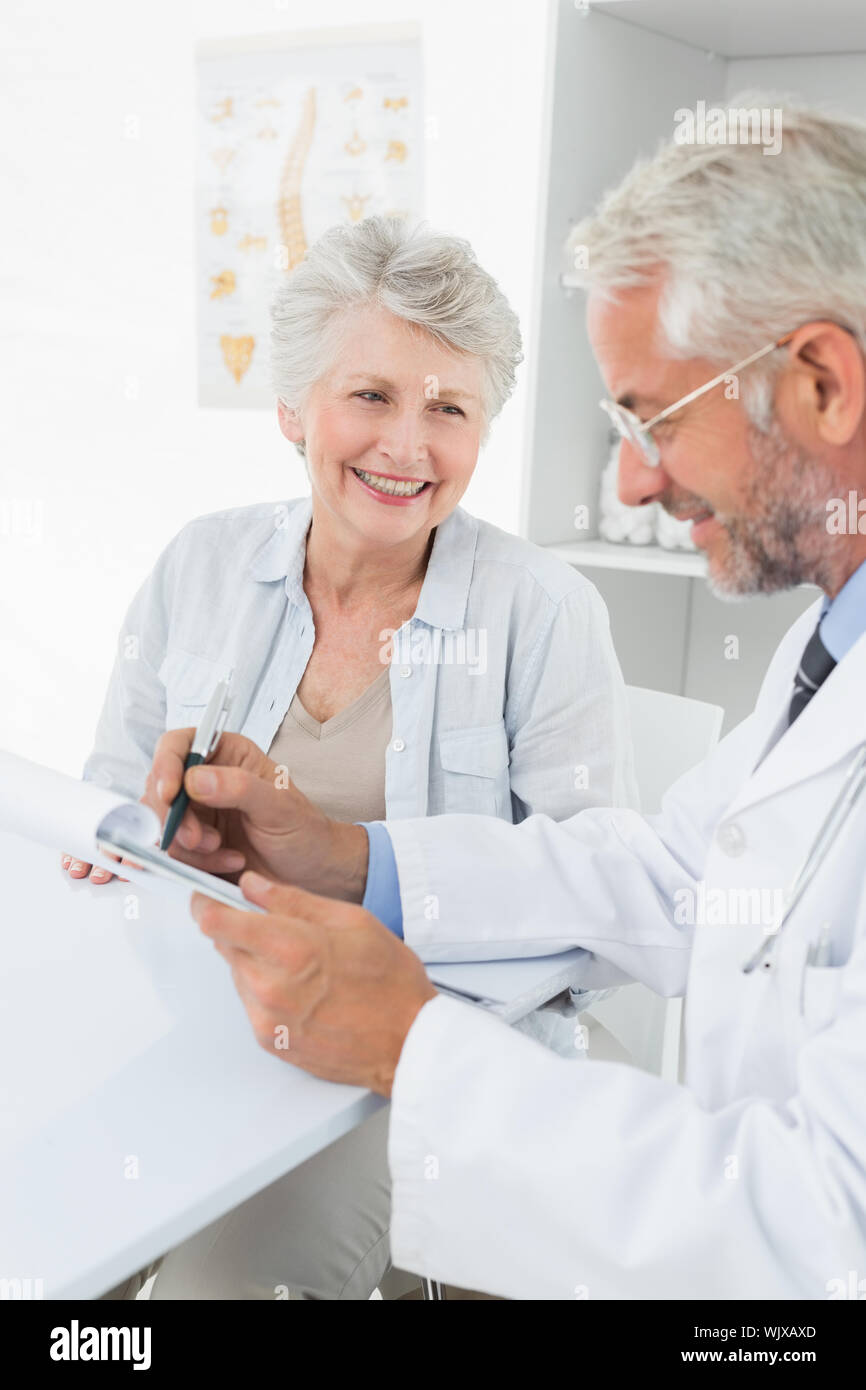 Female senior patient visiting a doctor at the medical office Stock ...