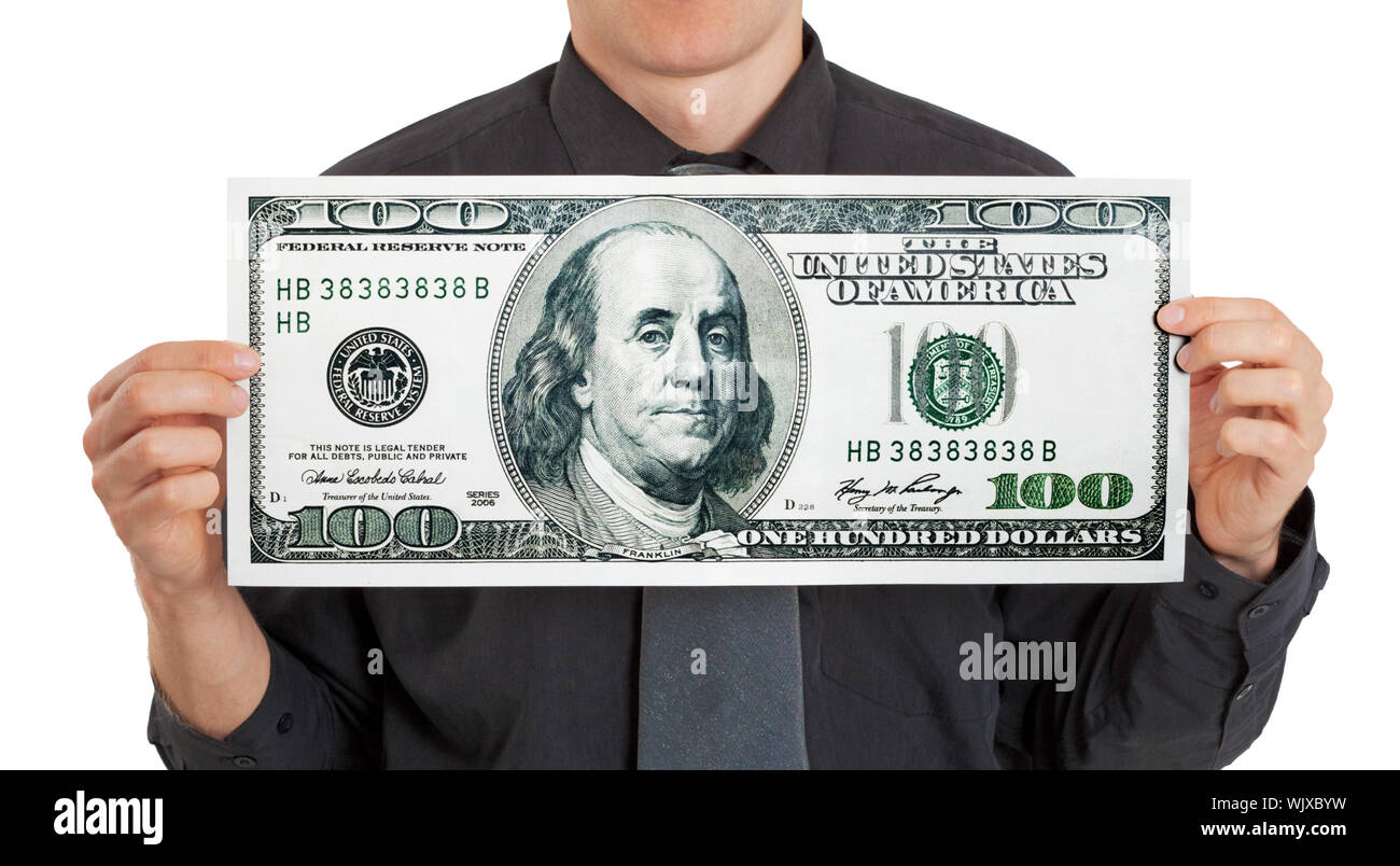Businessman holding a lot of money with both hands hi-res stock ...