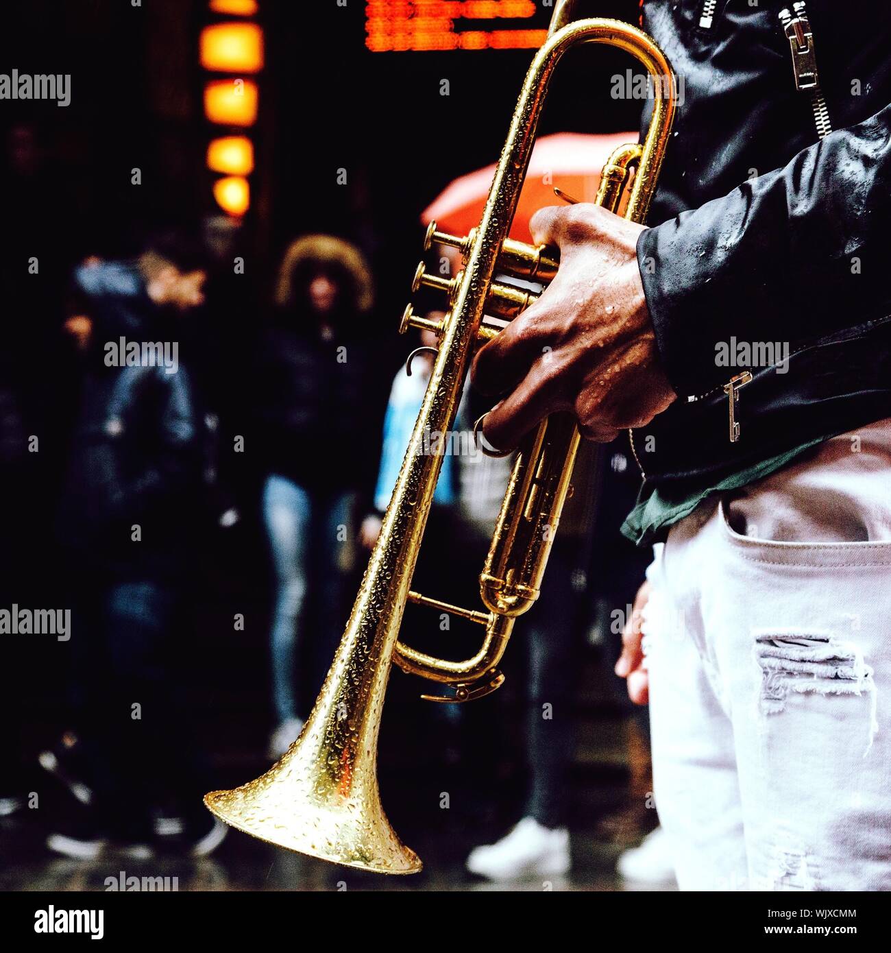 Man playing trumpet outdoors hi-res stock photography and images - Alamy