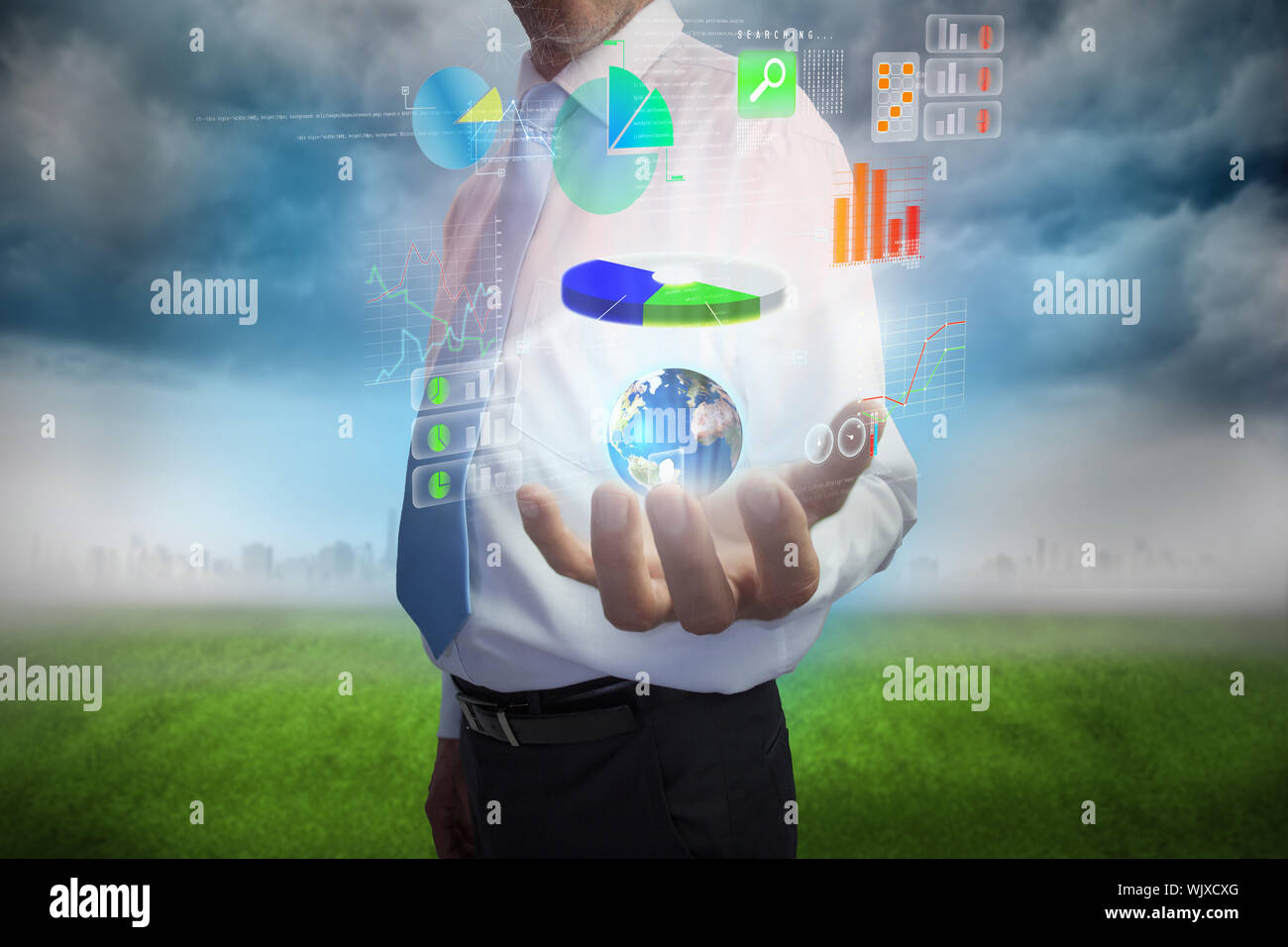 Digital composite of businessman presenting interface Stock Photo - Alamy