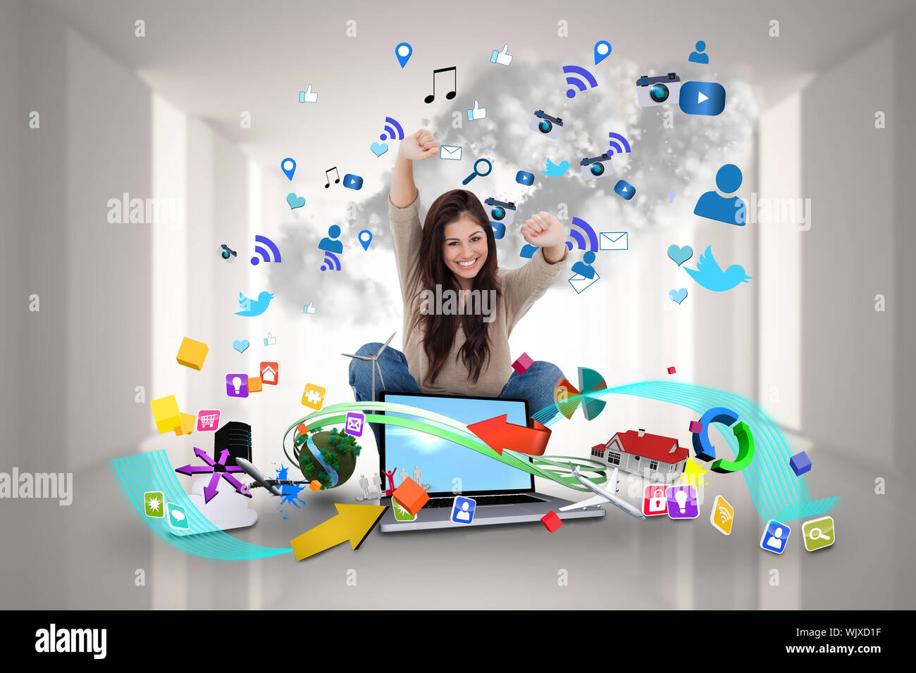 Digital composite of cheering girl using laptop with app icons Stock ...