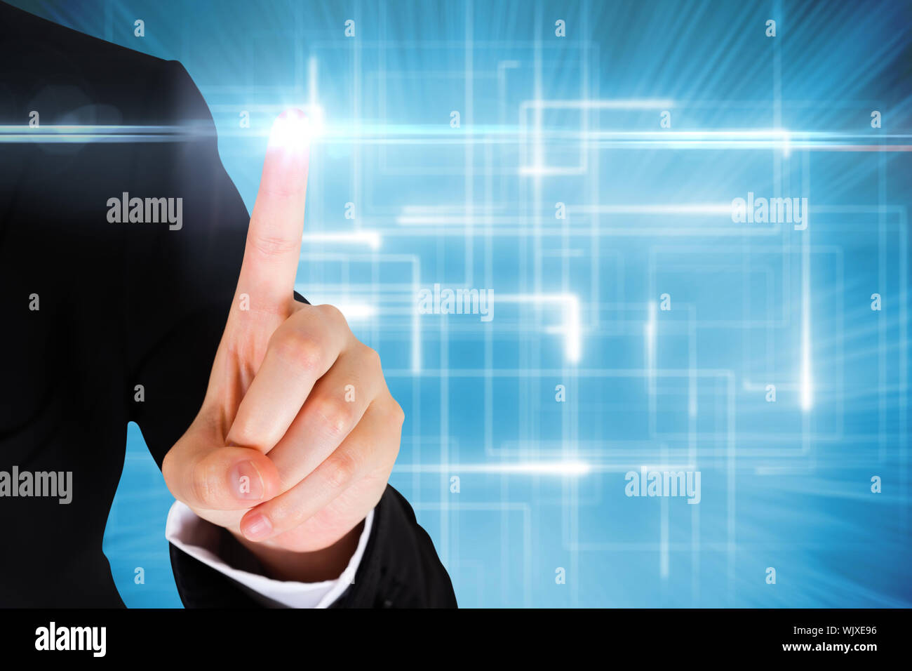 Digital composite of finger pointing to light Stock Photo - Alamy