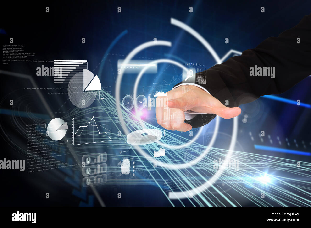 Digital composite of finger pointing to data interface Stock Photo - Alamy