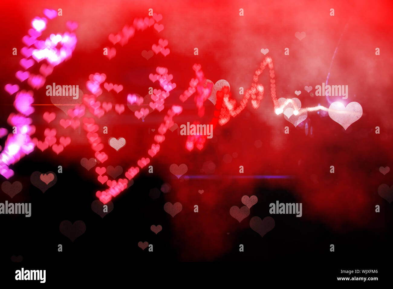 Digitally generated love background in red Stock Photo - Alamy