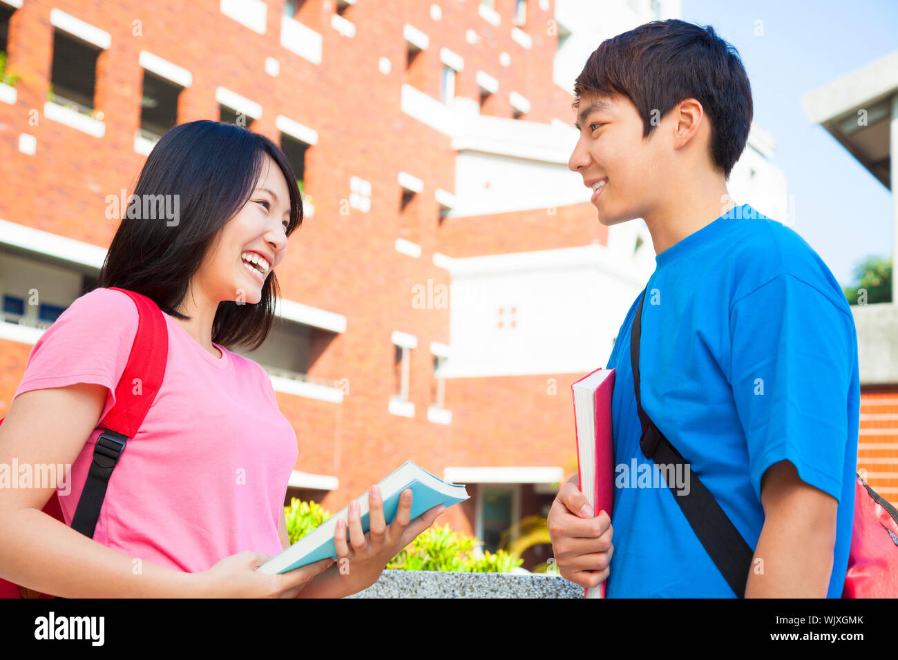 Two students classroom talk hi-res stock photography and images - Alamy