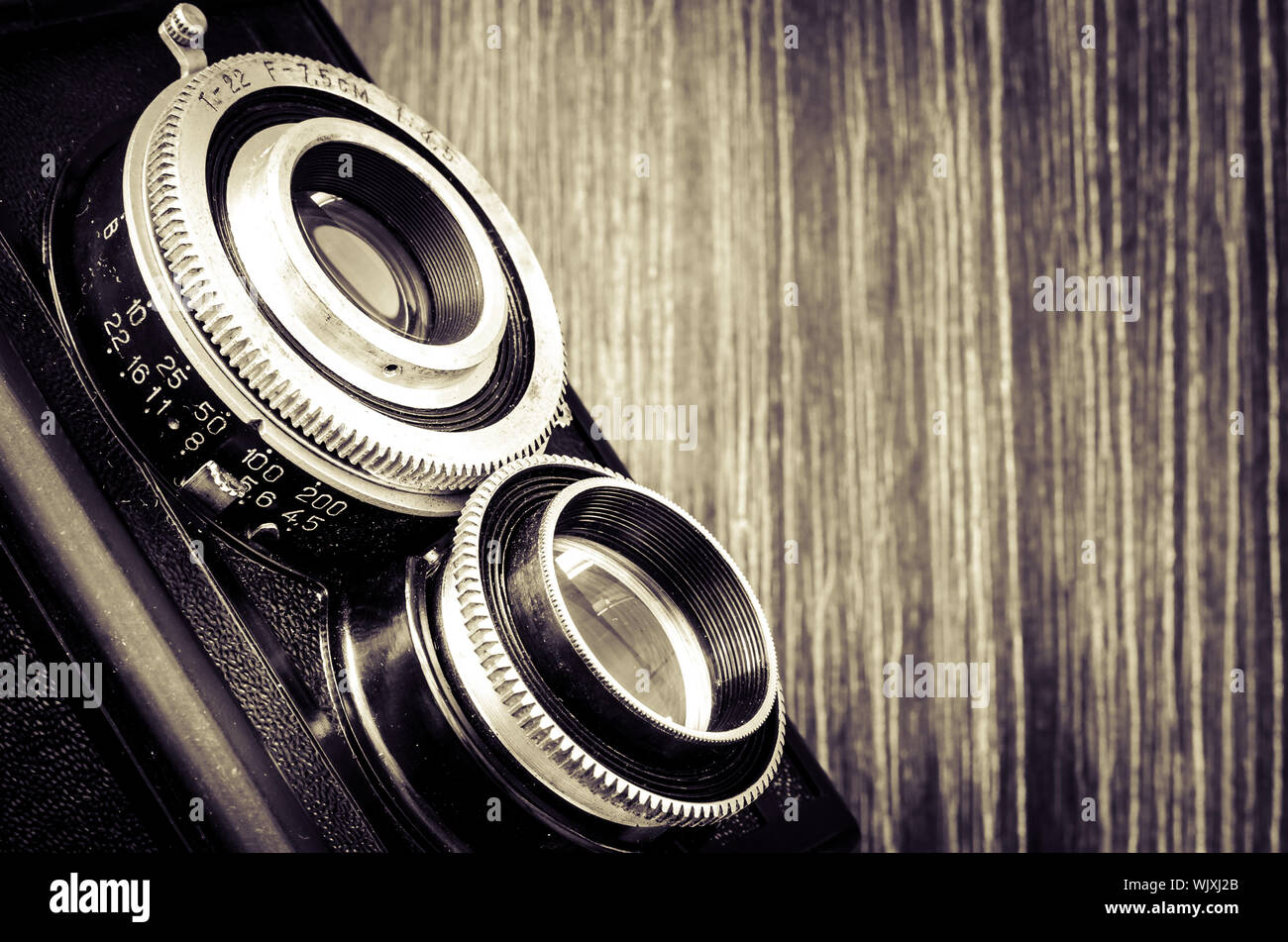 Detail of old fashioned classic camera in vintage style Stock Photo - Alamy