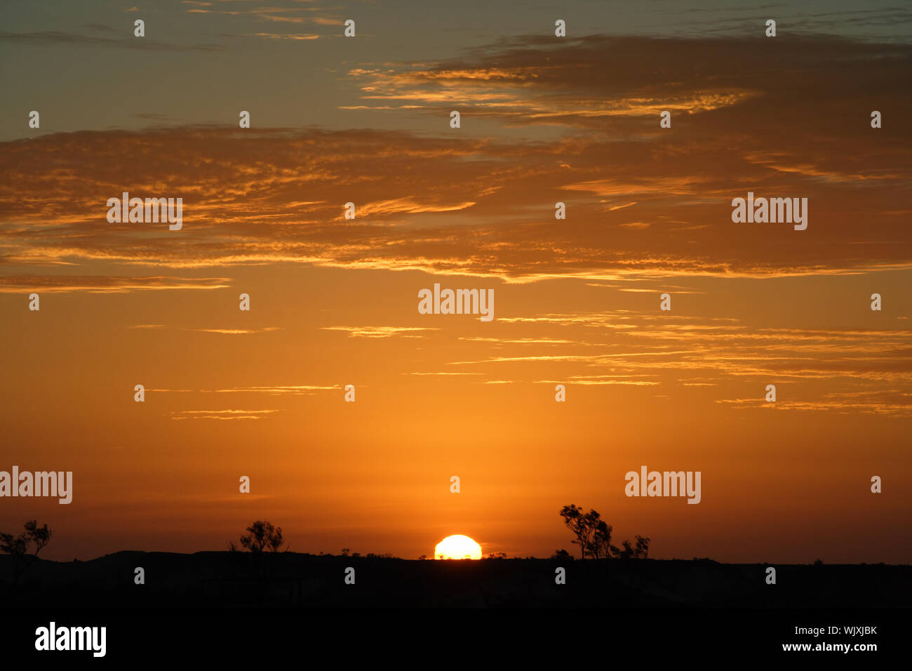 Australian outback sunset Stock Photo - Alamy