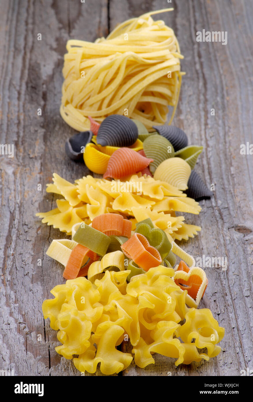 Arrangement of Spaghetti Nest, Pasta Shells, Bow Tie Pasta, Heart ...