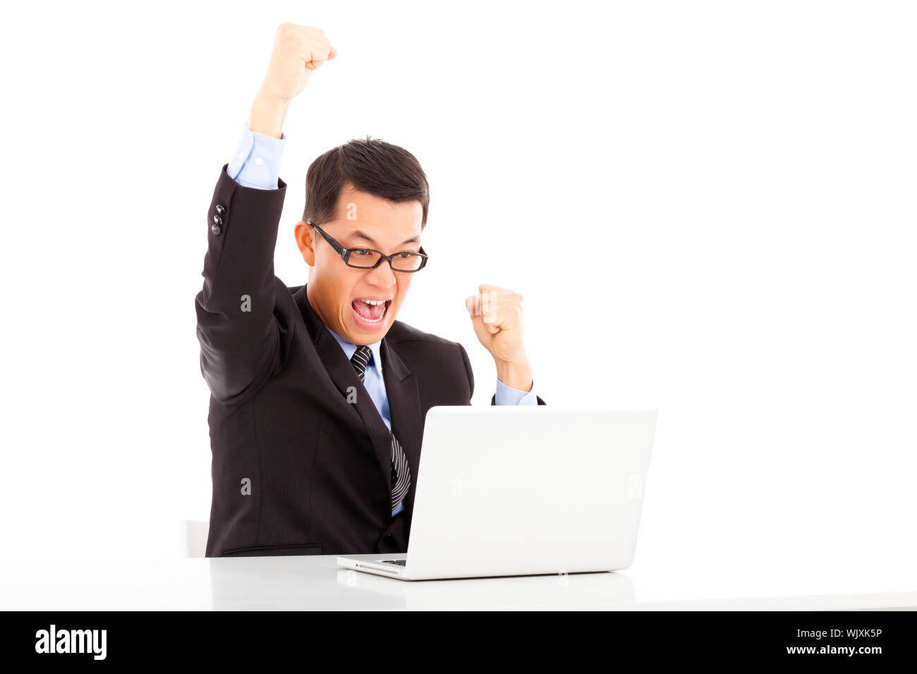 happy businessman raise his hands to celebrate victory Stock Photo - Alamy