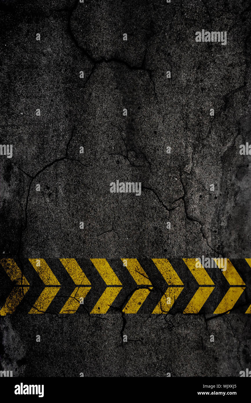 Asphalt background texture with construction signs Stock Photo - Alamy