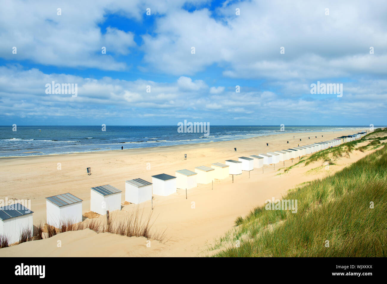 Row blue and white beach cabins for vacation surpose Stock Photo - Alamy