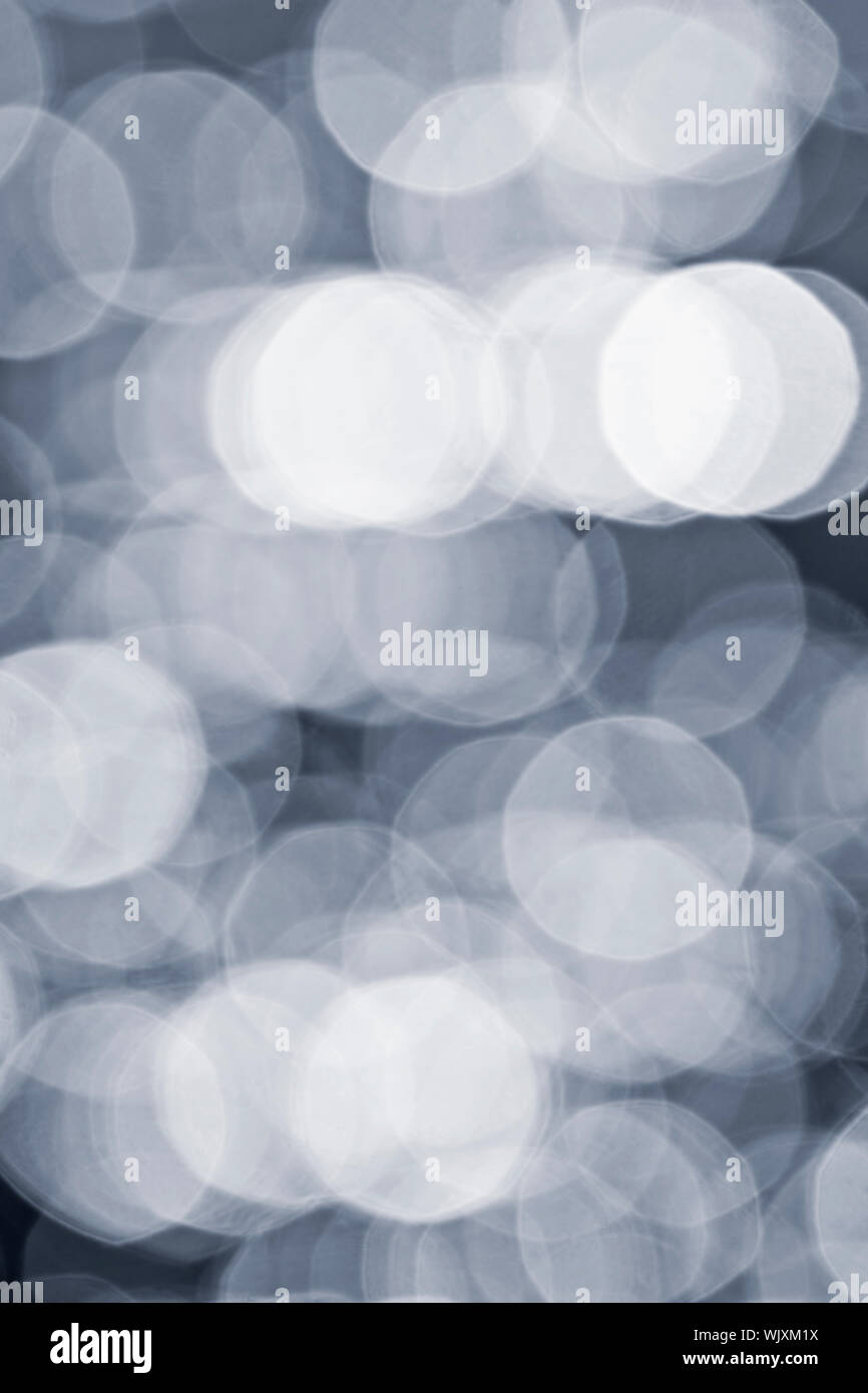 Abstract defocused bokeh grey background of light and shadows Stock ...