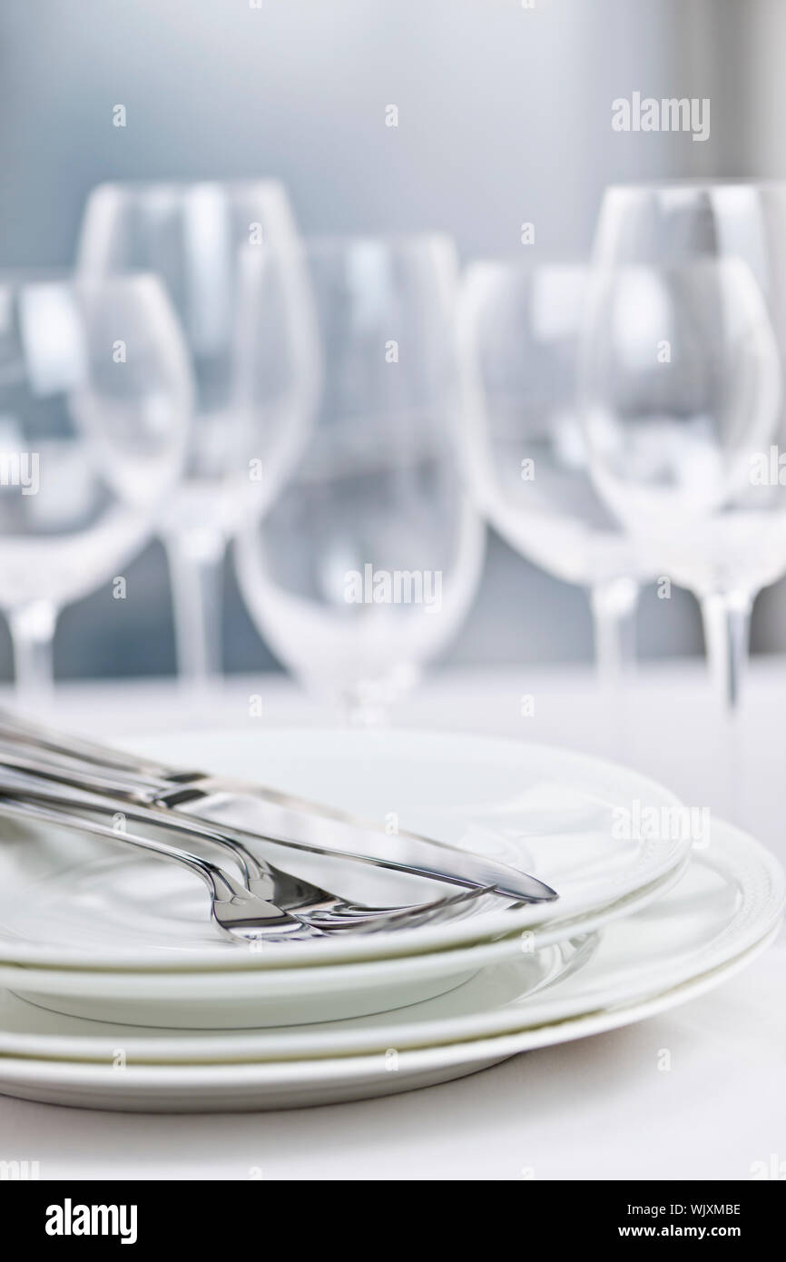 Elegant restaurant table setting for fine dining with plates cutlery ...