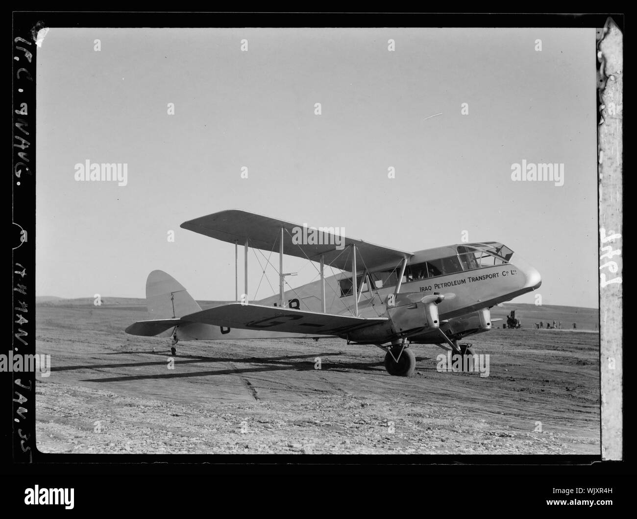 I.P.C. i.e., Iraq Petroleum Company. Plane on landing ground Stock ...