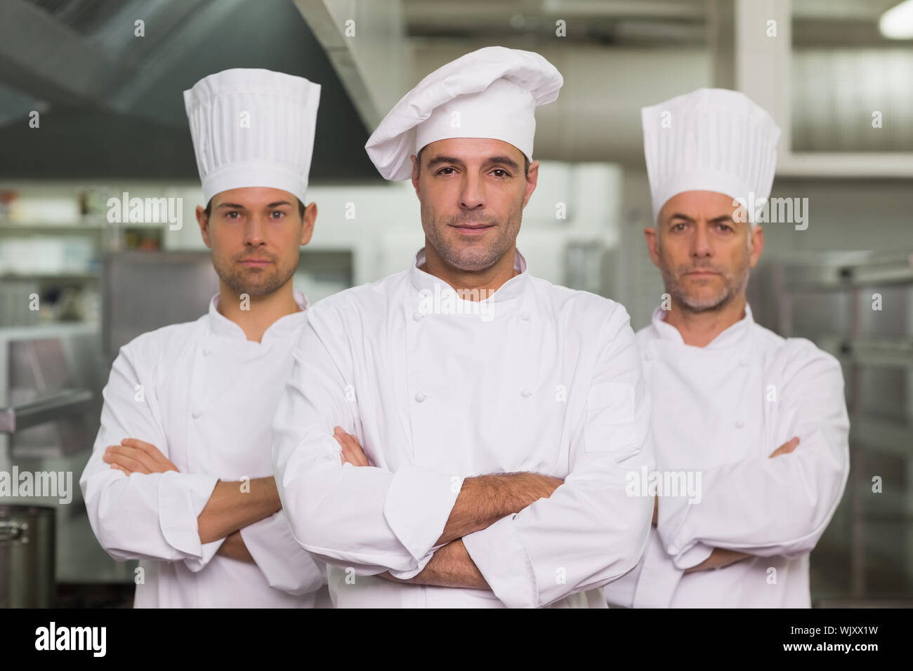 Kitchen staff serious hi-res stock photography and images - Alamy