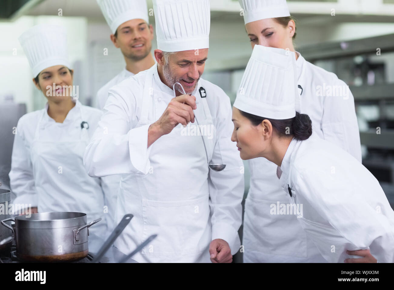 Head chef with team hi-res stock photography and images - Alamy