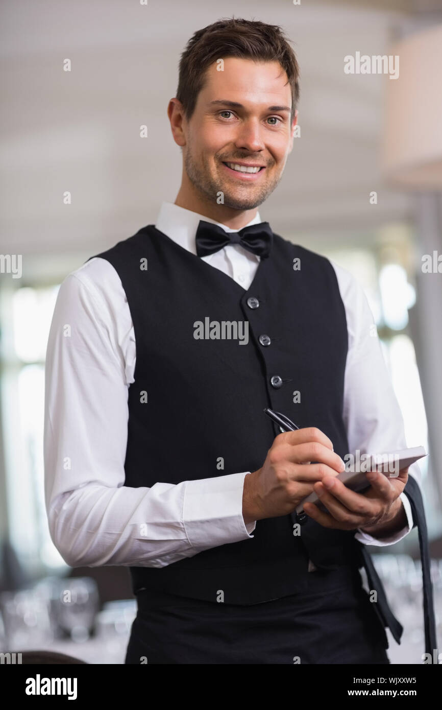 Handsome waiter taking an order hi-res stock photography and images - Alamy